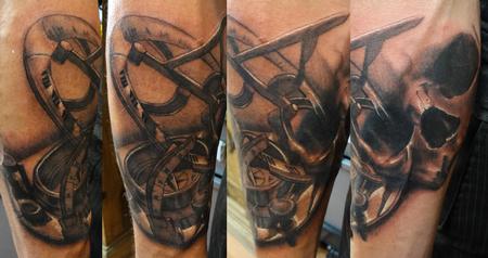skull and sundial by Ian Robert McKown: TattooNOW