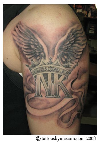 Wings and banner tattoo by Masami Pinky Inagaki: TattooNOW