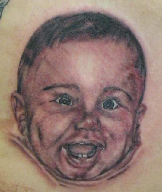 Black and gray baby portrait by Caroline Evans: TattooNOW
