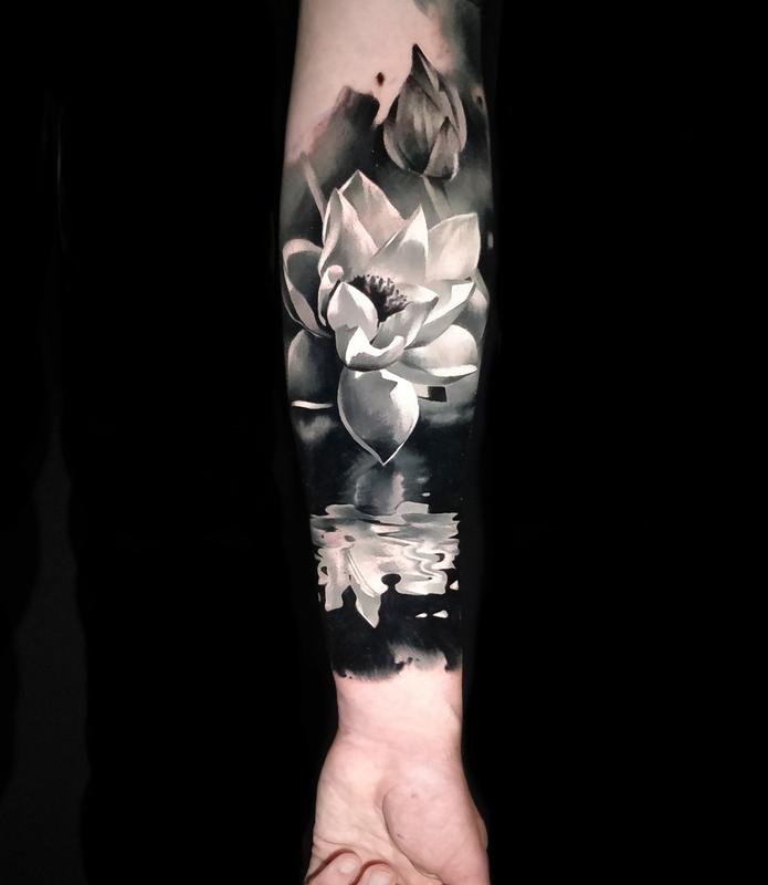 Lotus with reflection tattoo by Saga Anderson: TattooNOW