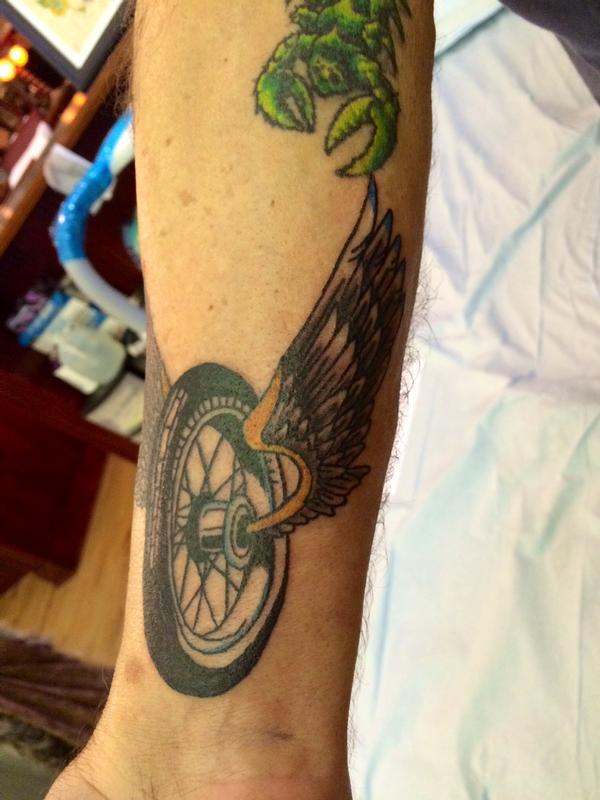 Flying wheel by Jen Godfrey: TattooNOW