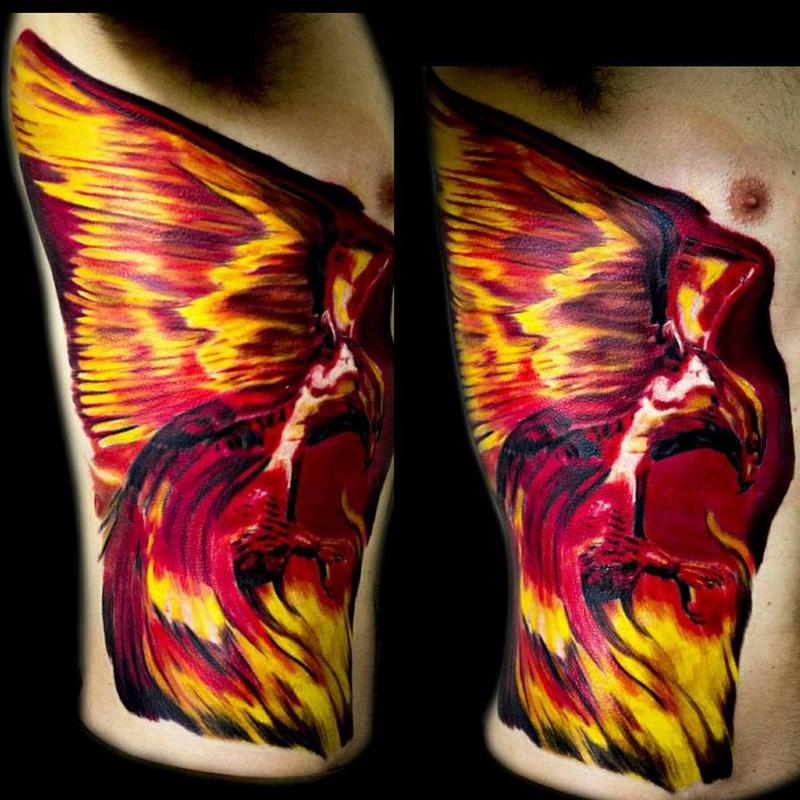 Phoenix on ribs by Mattlock Lopes: TattooNOW