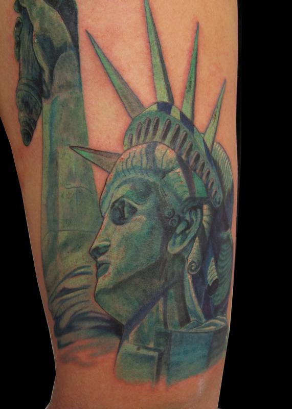 statue of liberty tattoo by Andre Cheko: TattooNOW