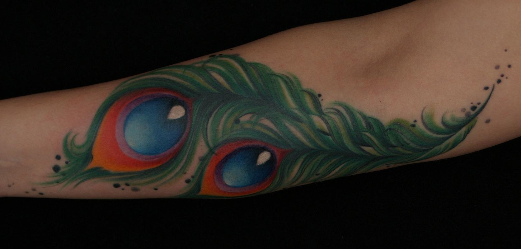 colorful realistic peacock feathers tattoo by Tim Mcevoy: TattooNOW