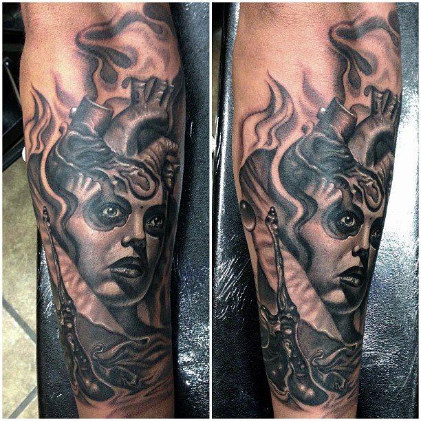 Surreal Heart Face by Timothy B Boor: TattooNOW