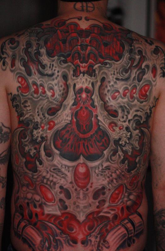 Biomech back tattoo by Phil Robertson: TattooNOW