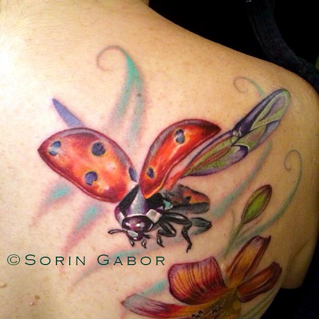 Realistic color flower and ladybug tattoo-ladybug detail by Sorin Gabor ...