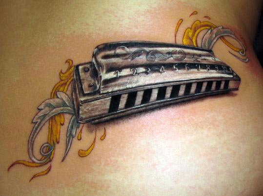 Harmonica tattoo by Stefano Alcantara: TattooNOW